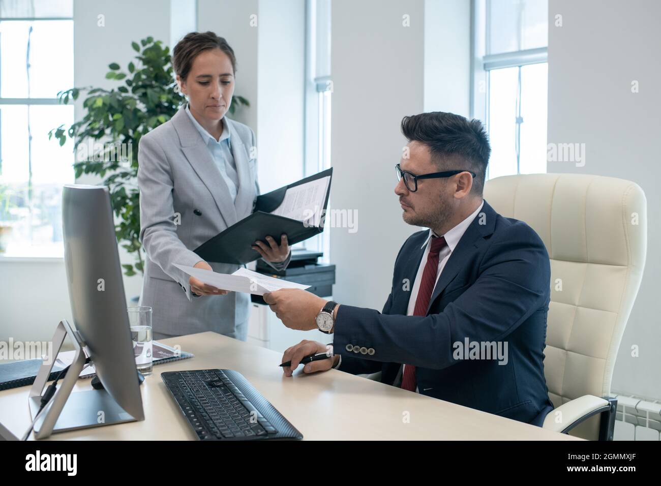 People passing by signing hi-res stock photography and images - Alamy