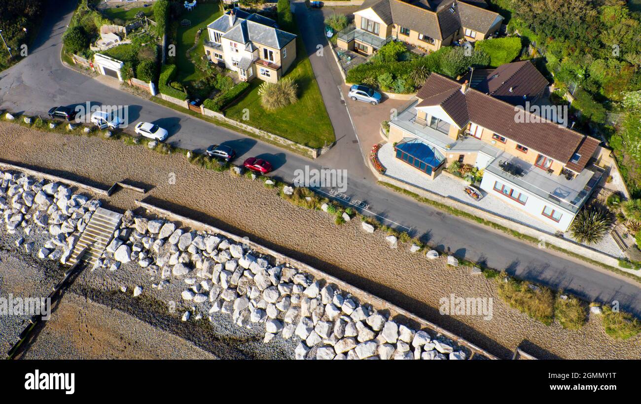 Cose-up. aerial view of some seafront houses at Oldstairs Bay ...