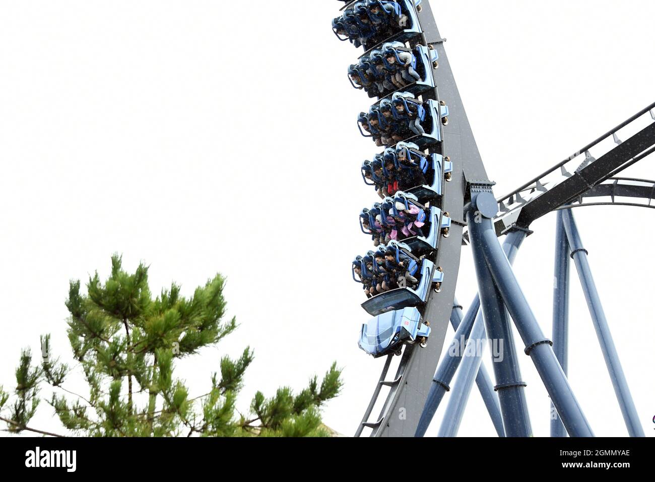 Beijing, China. 20th Sep, 2021. Tourists experience a roller coaster at ...