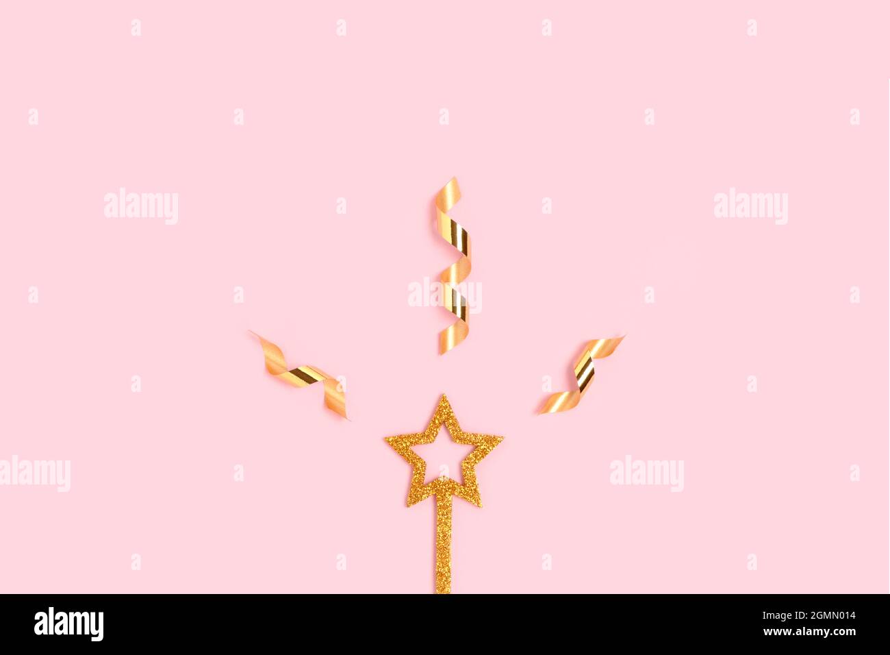 Golden glittering magic wand in a star shape with confetti. Festive ...