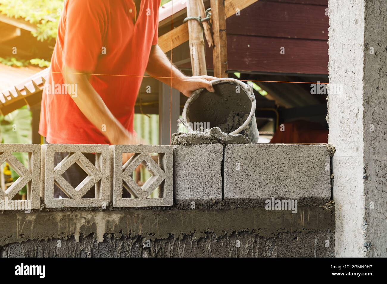 Motion blur bricklayer man working build for construction at home Stock ...