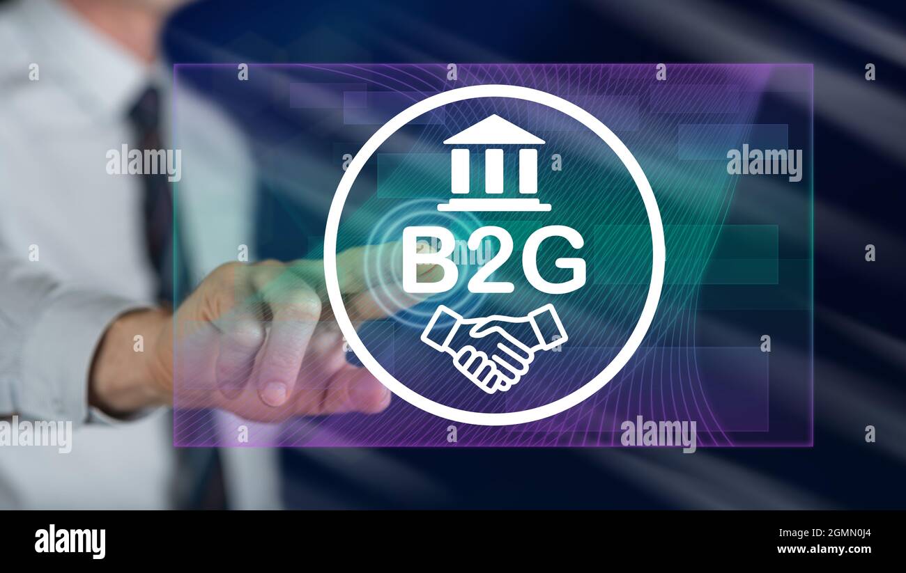 Man touching a b2g concept on a touch screen with his finger Stock Photo - Alamy