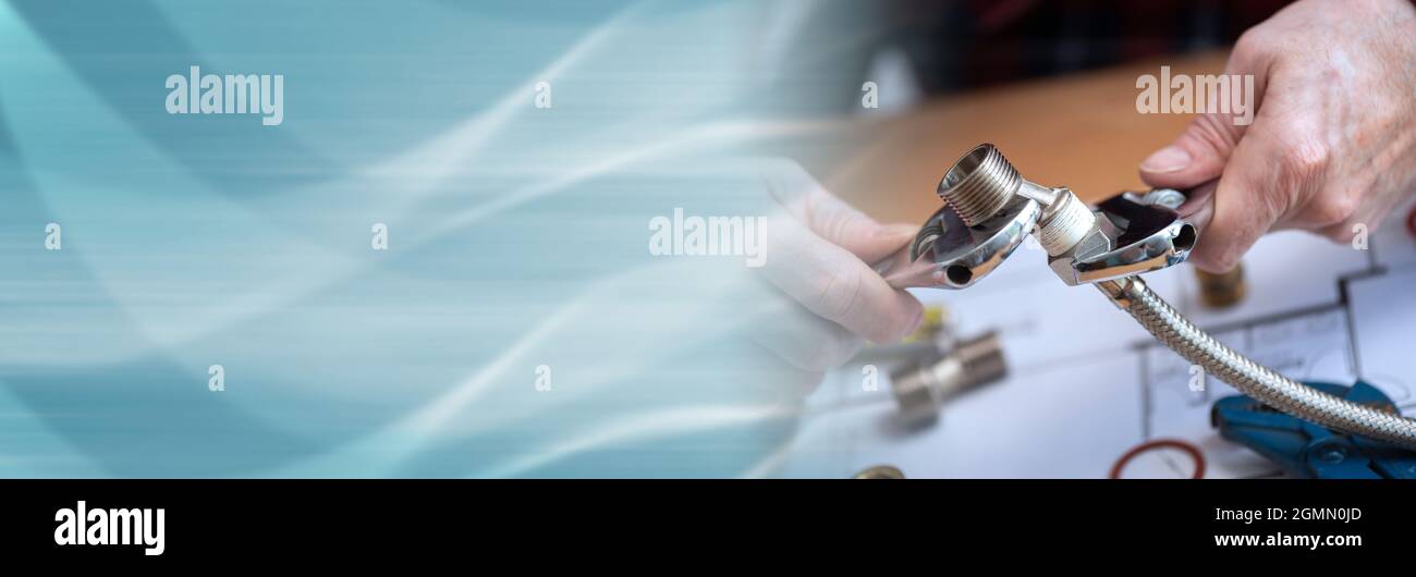 Plumber screwing a plumbing fitting on a pipe; panoramic banner Stock ...