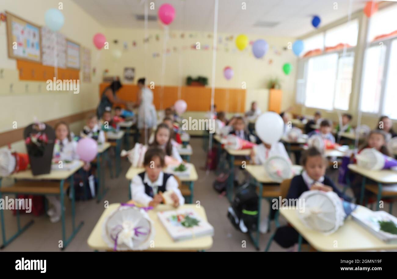 Kids in classroom in primary school, blurred Stock Photo - Alamy