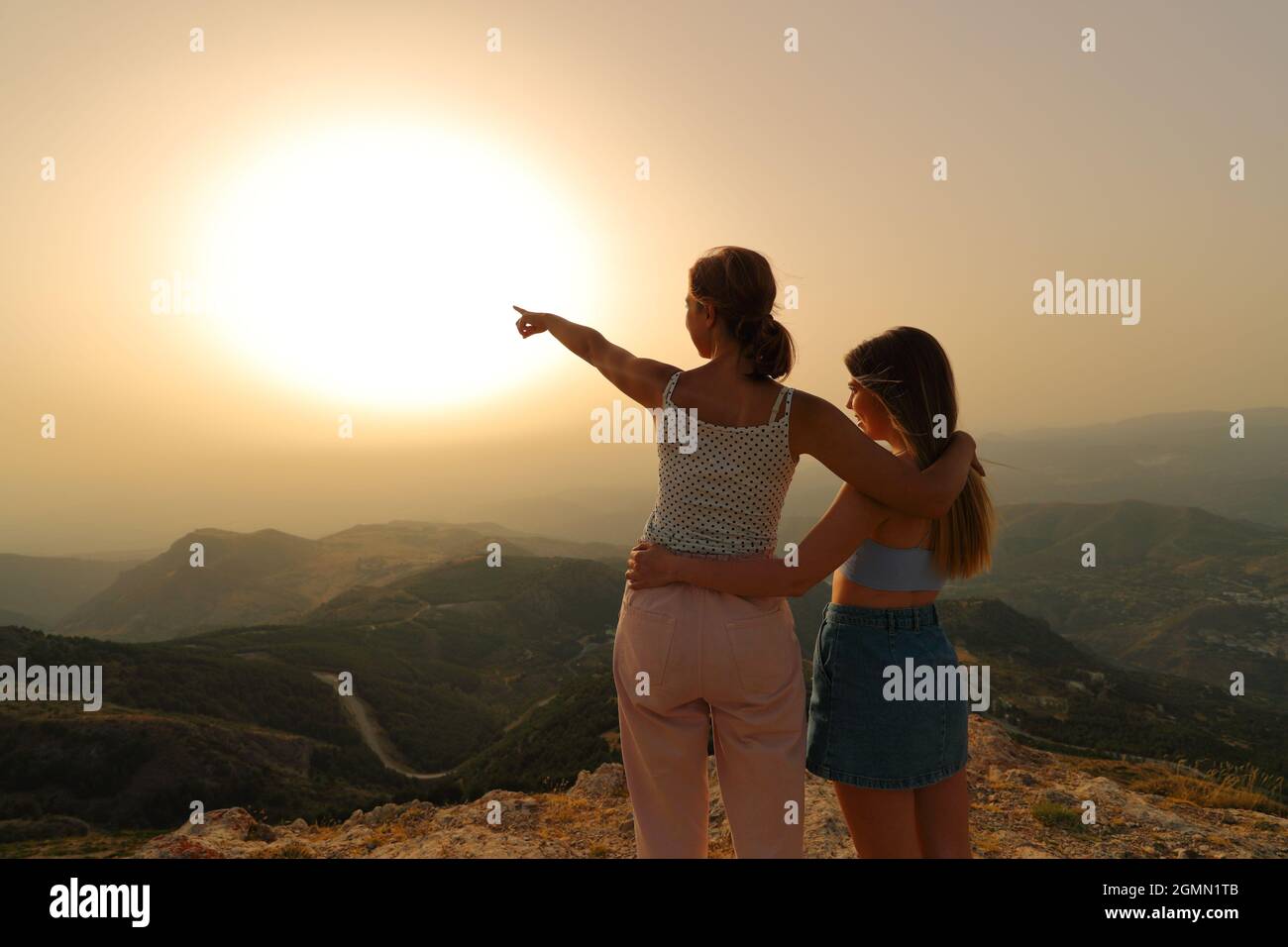 Women in sunset hi-res stock photography and images - Alamy