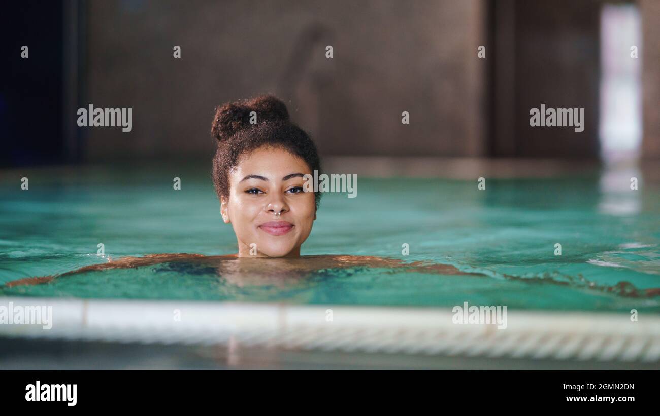 Woman edge pool water looking hi-res stock photography and images - Alamy