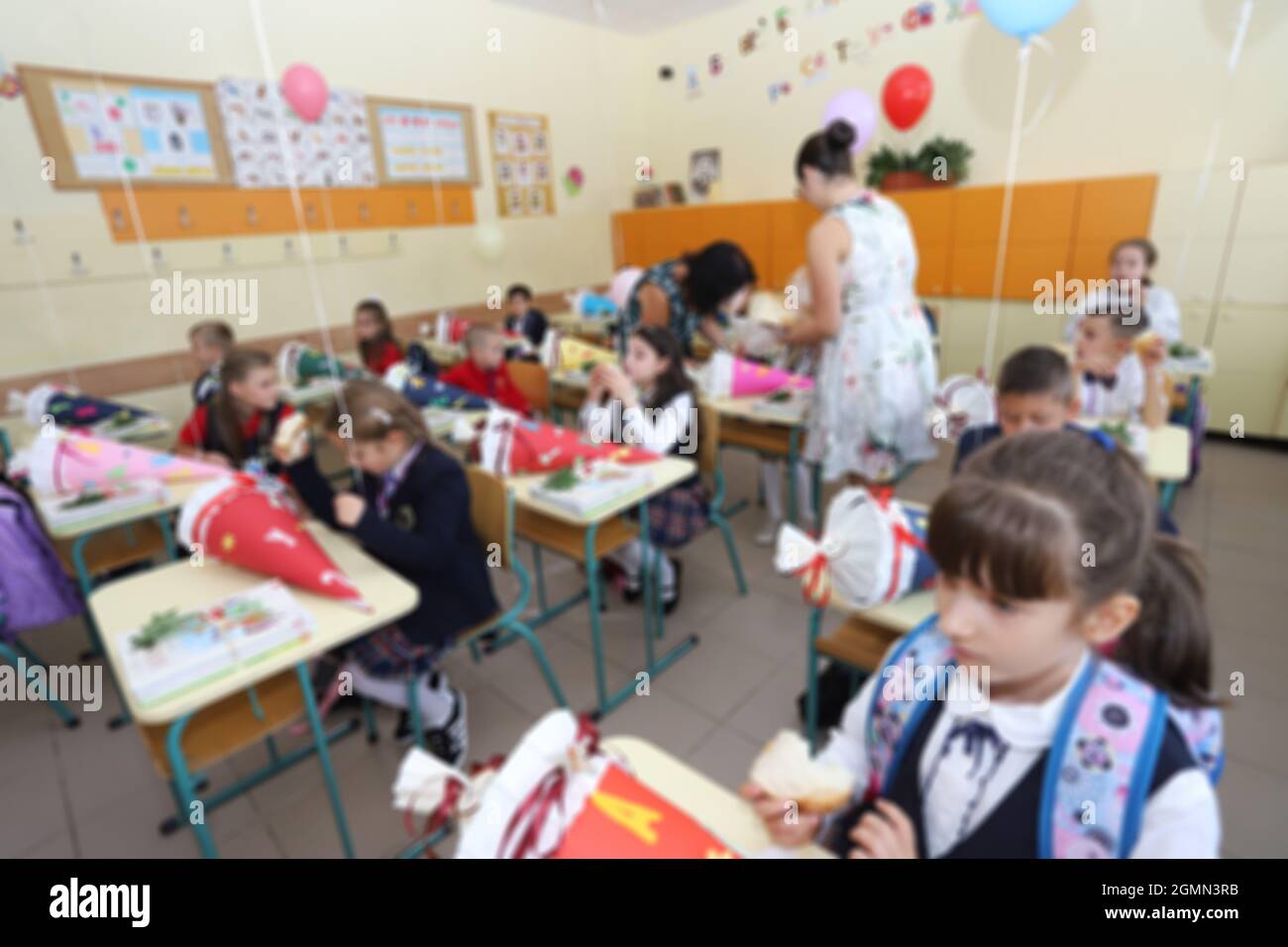 Kids in classroom in primary school, blurred Stock Photo - Alamy