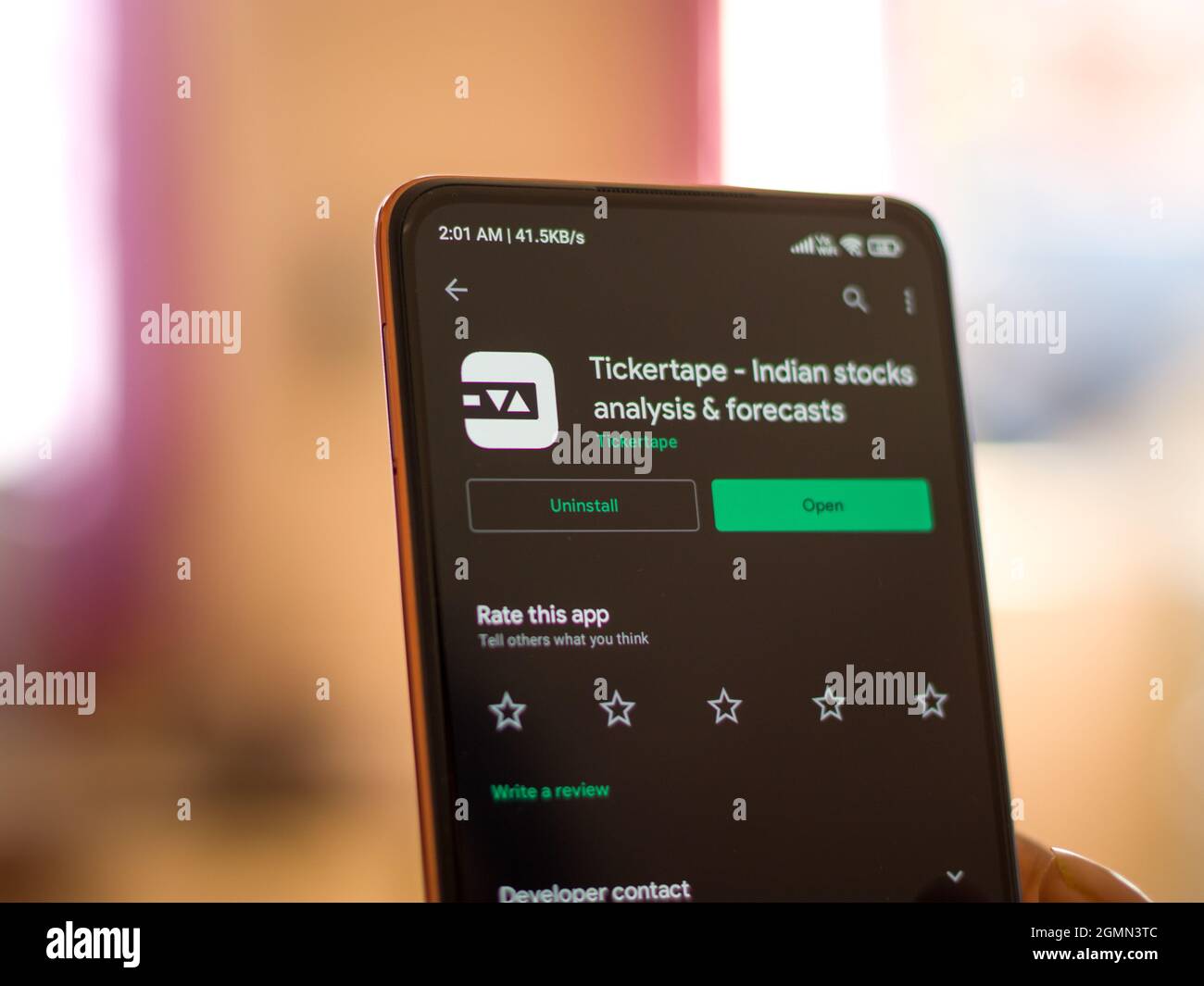 West Bangal, India - August 21, 2021 : Ticker tape logo on phone screen ...