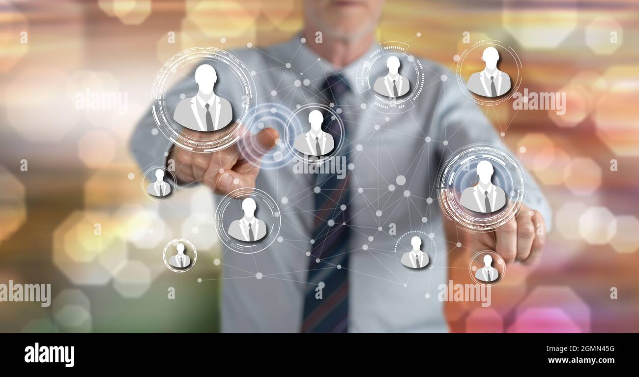 Man touching a cooperation concept on a touch screen with his fingers ...