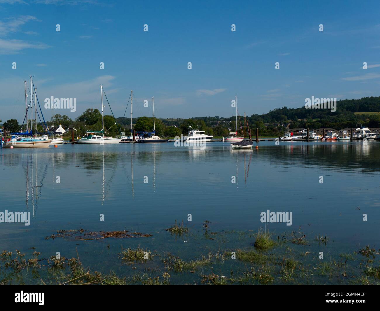 View across Harbour and marina Kirkcudbright town with moored boats ...