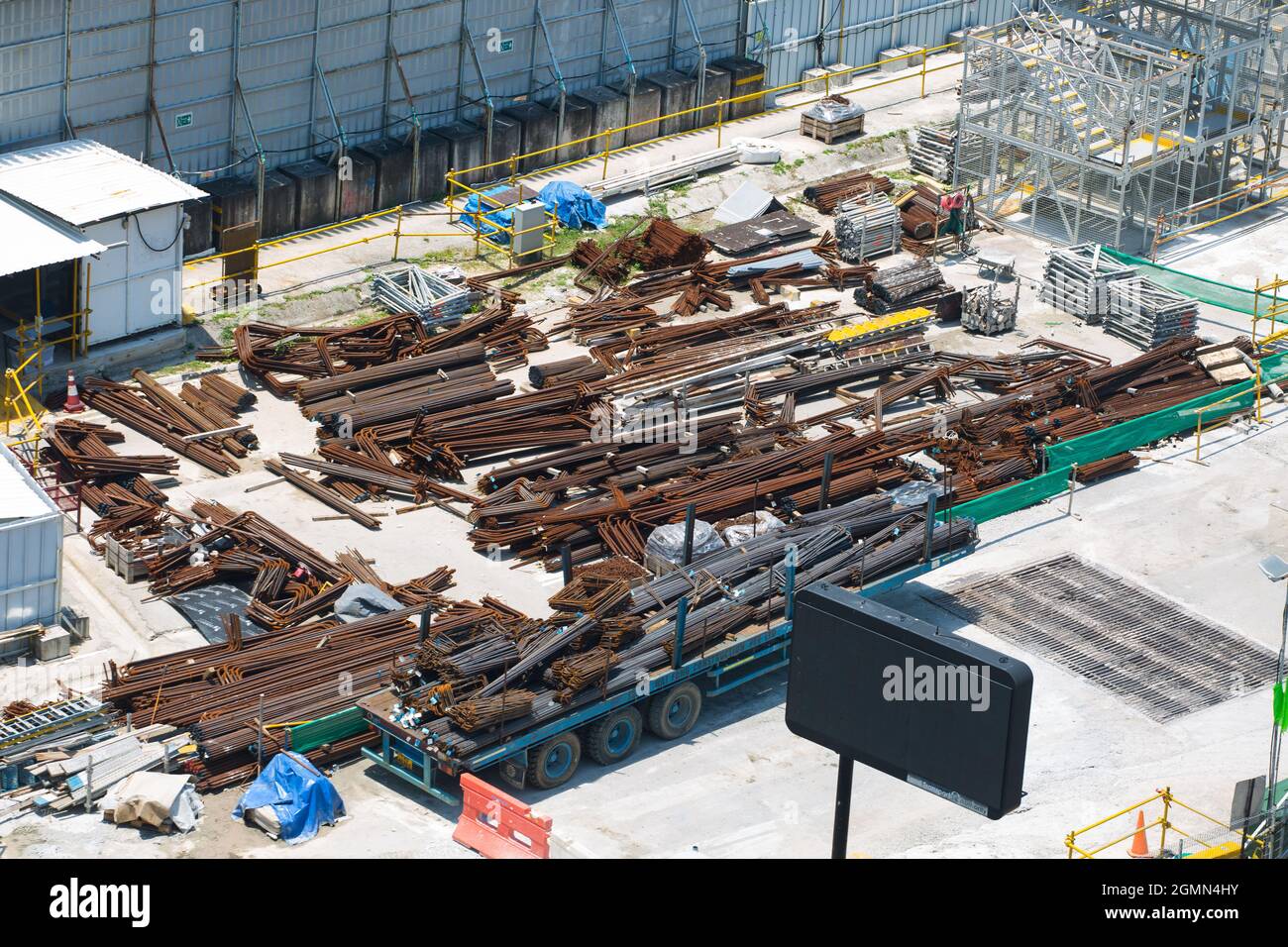 Aerial view of chunks of industrial heavy steel lay out on the storage ...