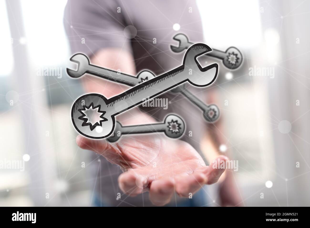 Maintenance service concept above the hand of a man in background Stock ...