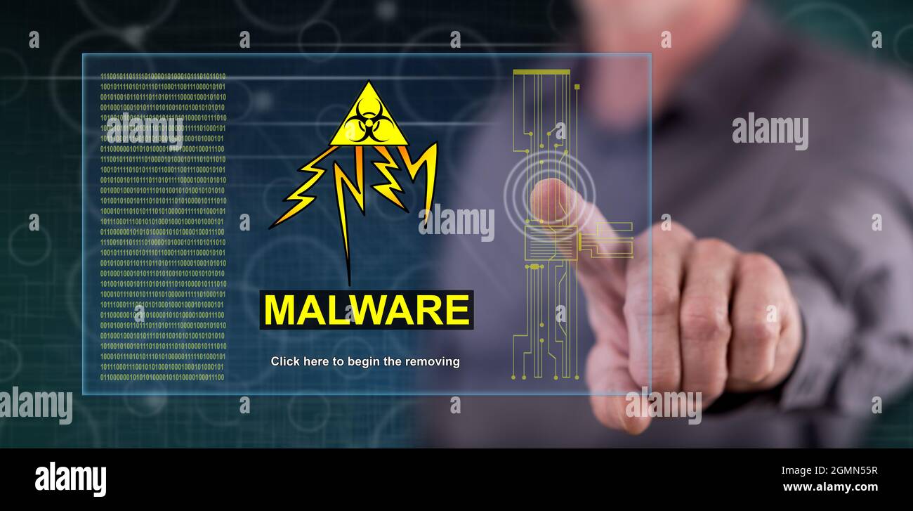 Man touching a malware concept on a touch screen with his finger Stock ...
