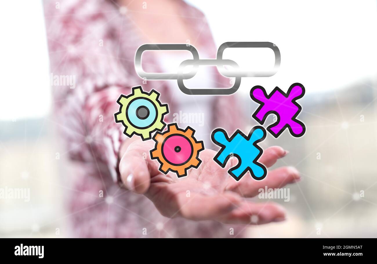 Teamwork concept above the hand of a woman in background Stock Photo ...