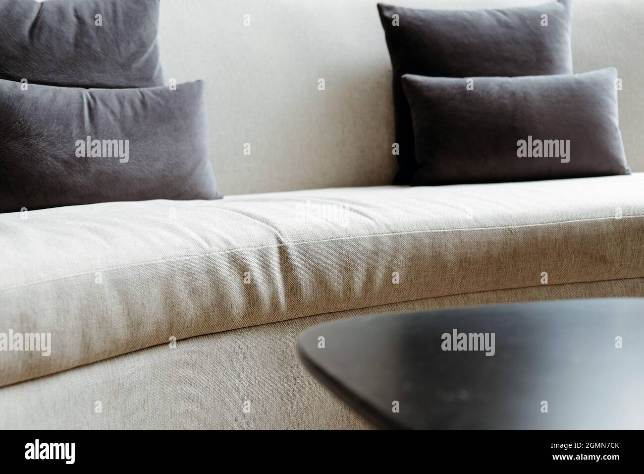 Detail image of cushion on sofa, modern living room Stock Photo - Alamy
