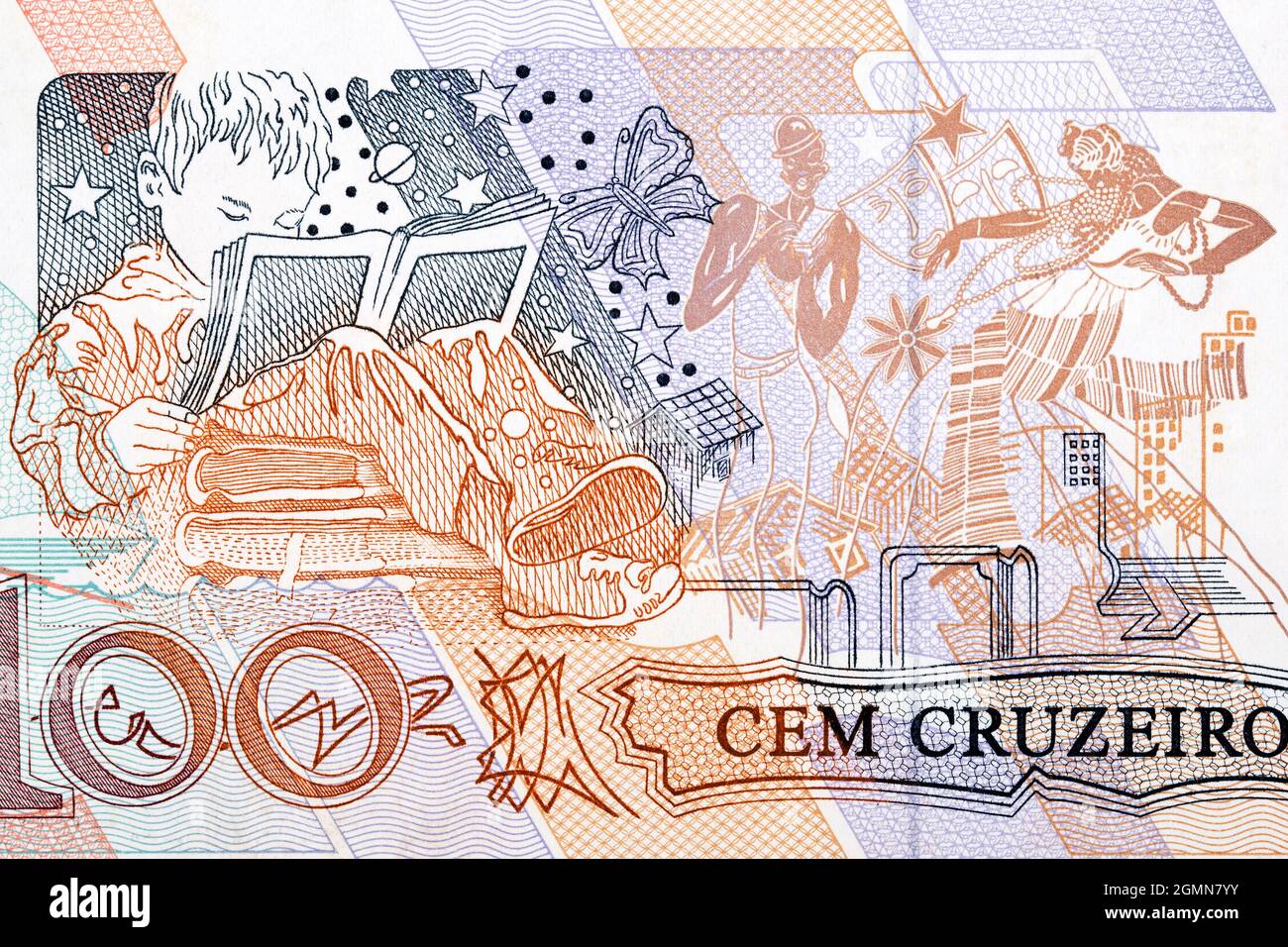 Child reading the book from old Brazilian money Stock Photo - Alamy
