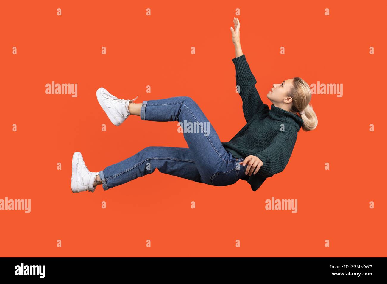 One caucasian young beautiful girl posing isolated on red studio ...