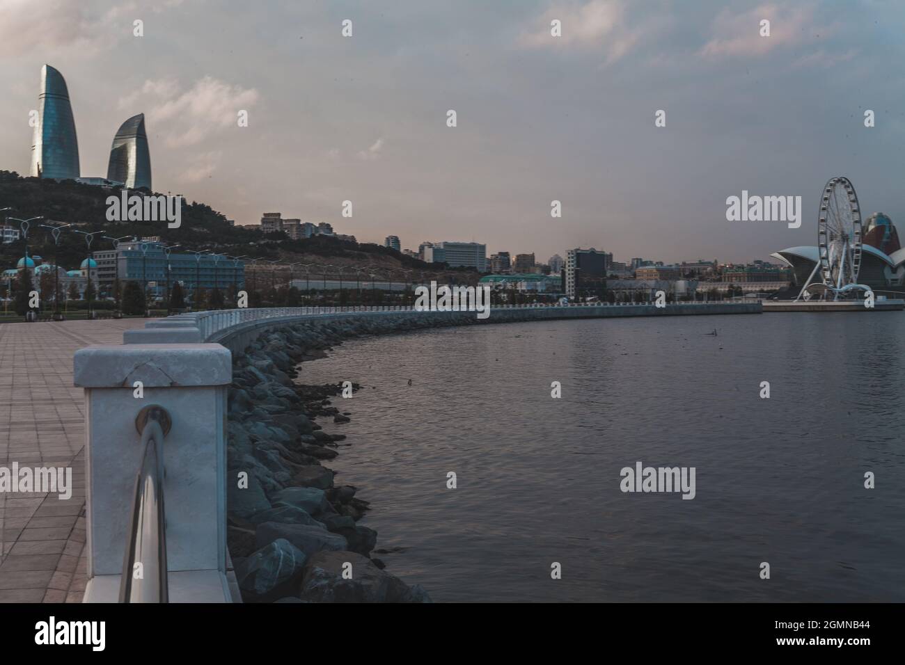 Embankment of Baku at sunset. Cloudy sunset sky in waterfront in Baku ...