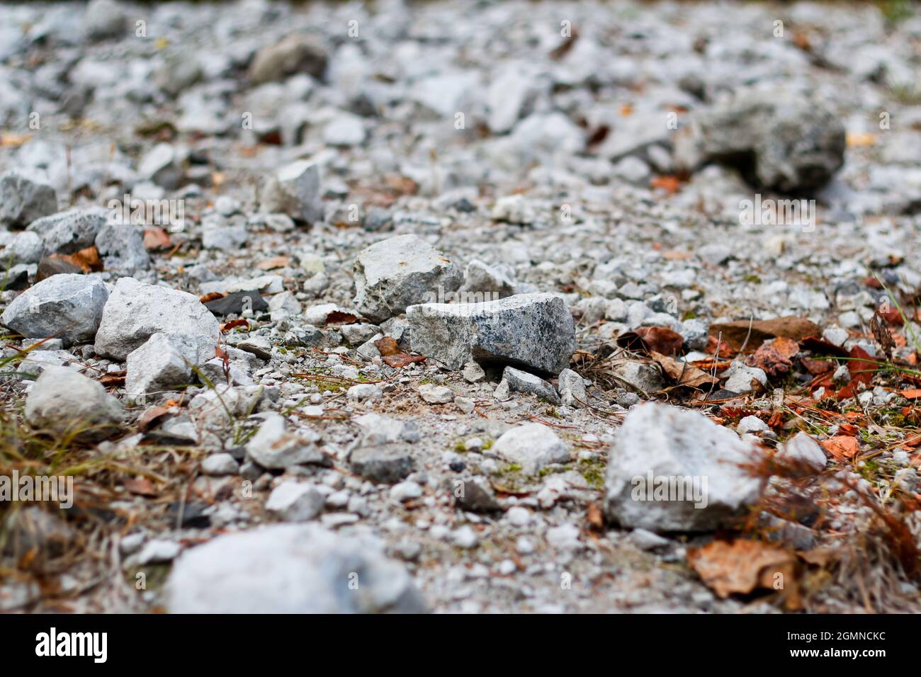 Defocus many crushed stones in mound or memorial. Gravel of jews people ...