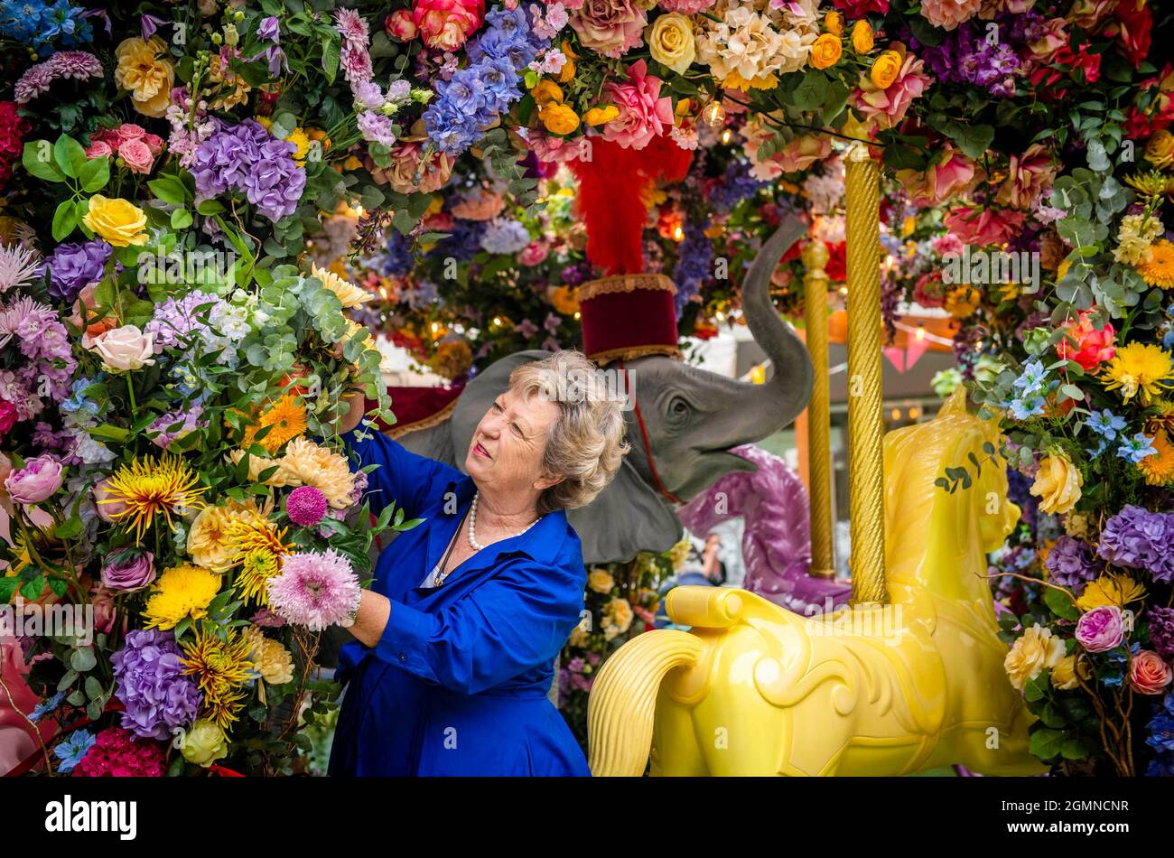 EDITORIAL USE ONLY Florist Judith Blacklock puts the finishing touches ...