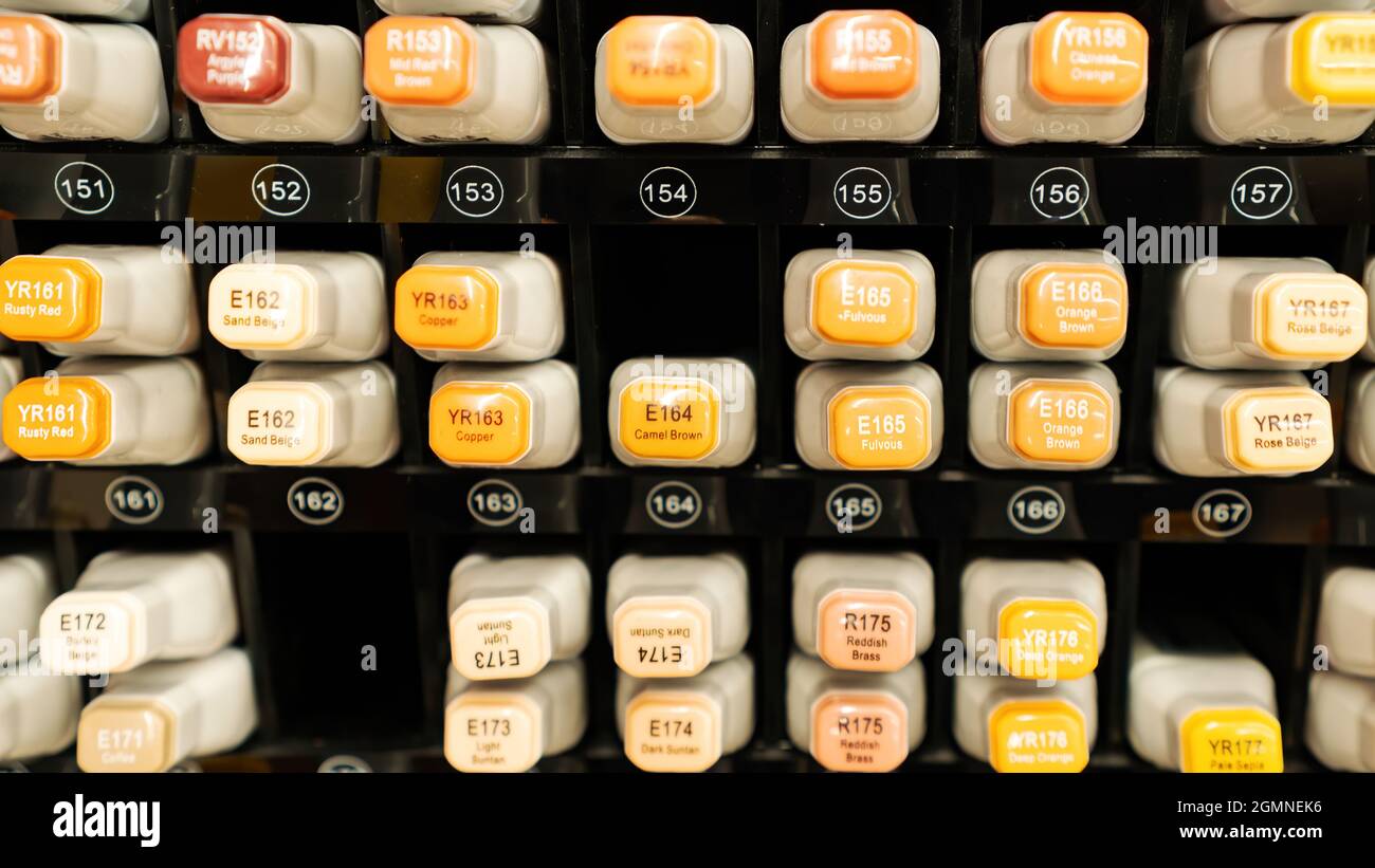 Alcohol markers close-up background. Sketching markers are color-coded ...