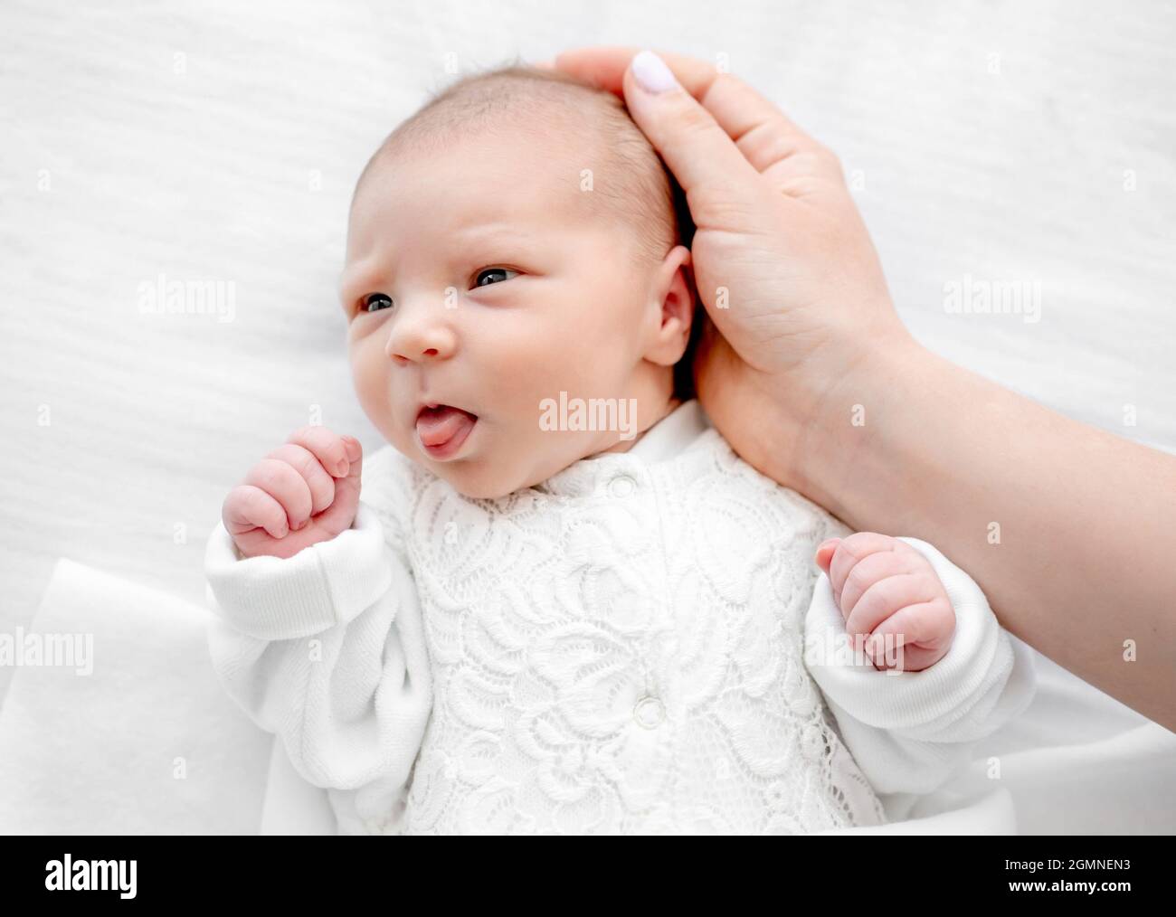Newborn baby and mother hand Stock Photo - Alamy