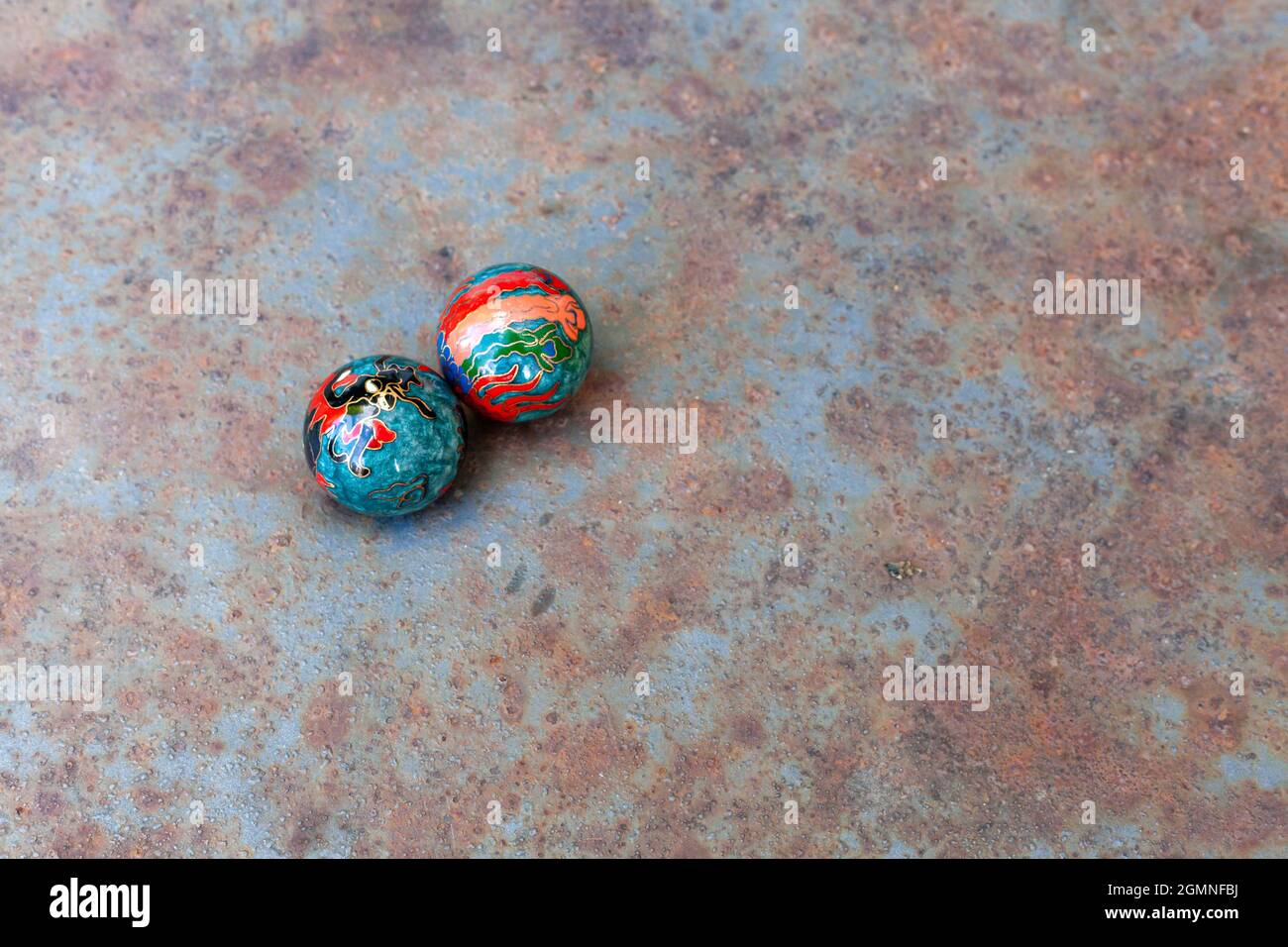 Top view of a couple of Baoding balls on a rusty meta Stock Photo - Alamy