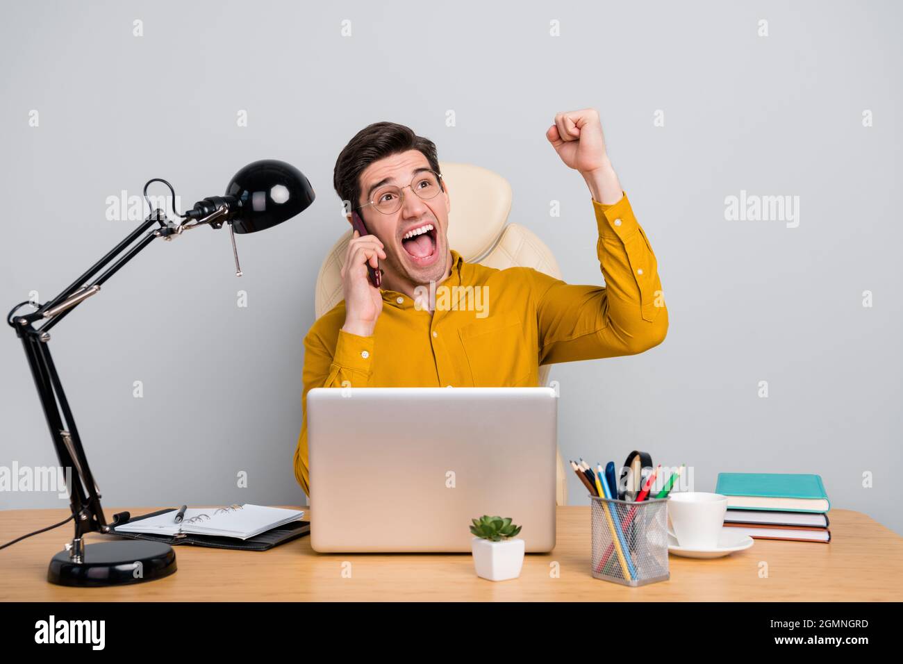 Portrait of handsome smart clever cheerful man calling partner ...