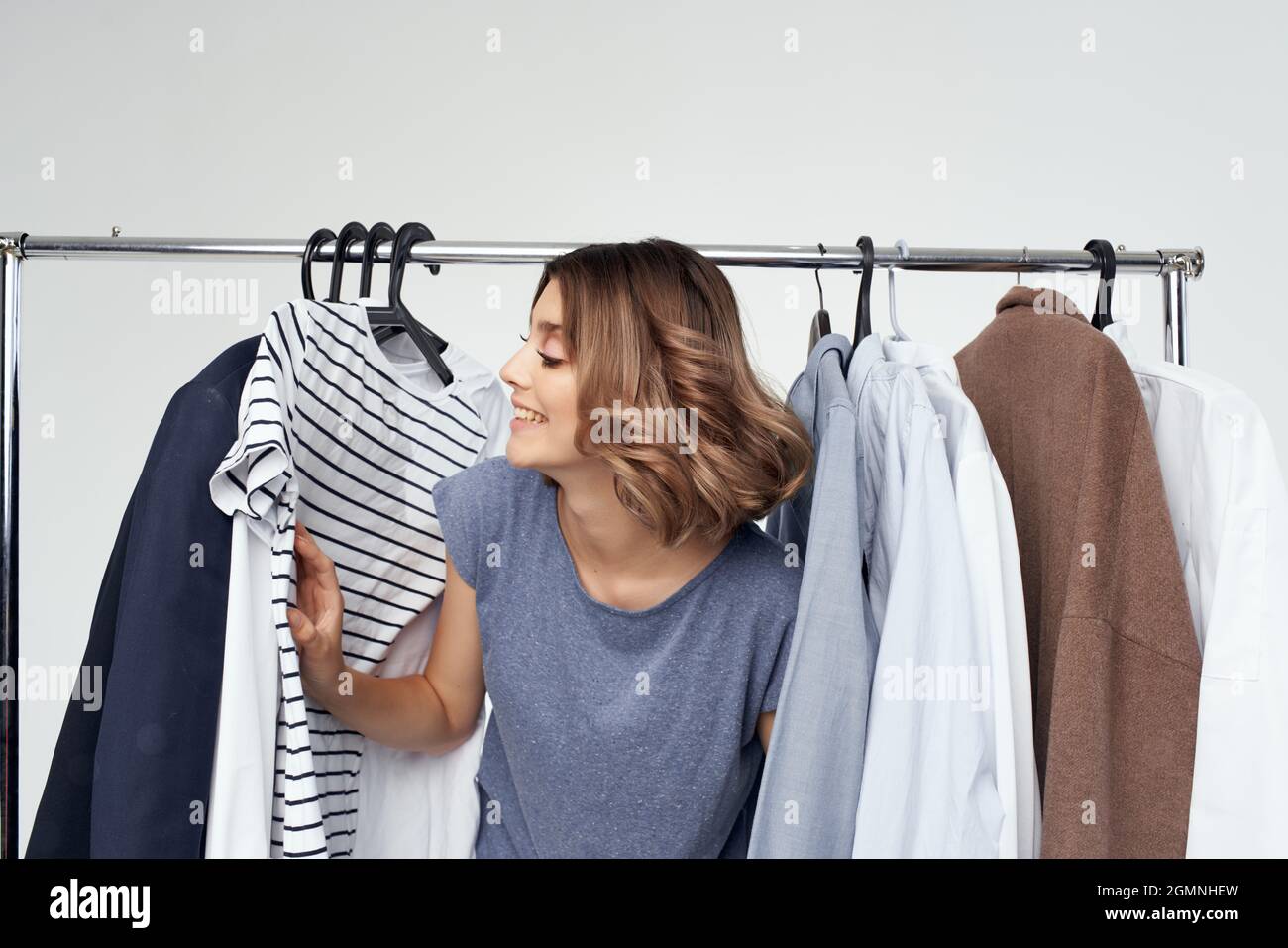 beautiful woman clothes fitting modern style light background Stock ...