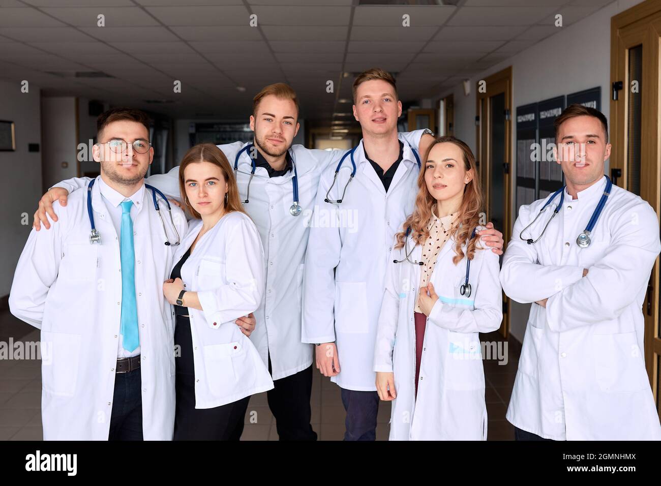 Group of students in corridor of medical university. School of nurses ...