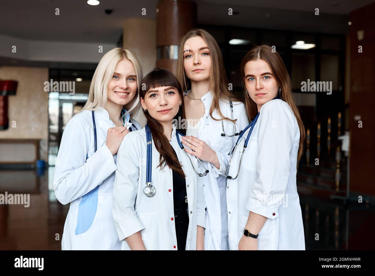 Group of students in corridor of medical university. School of nurses ...