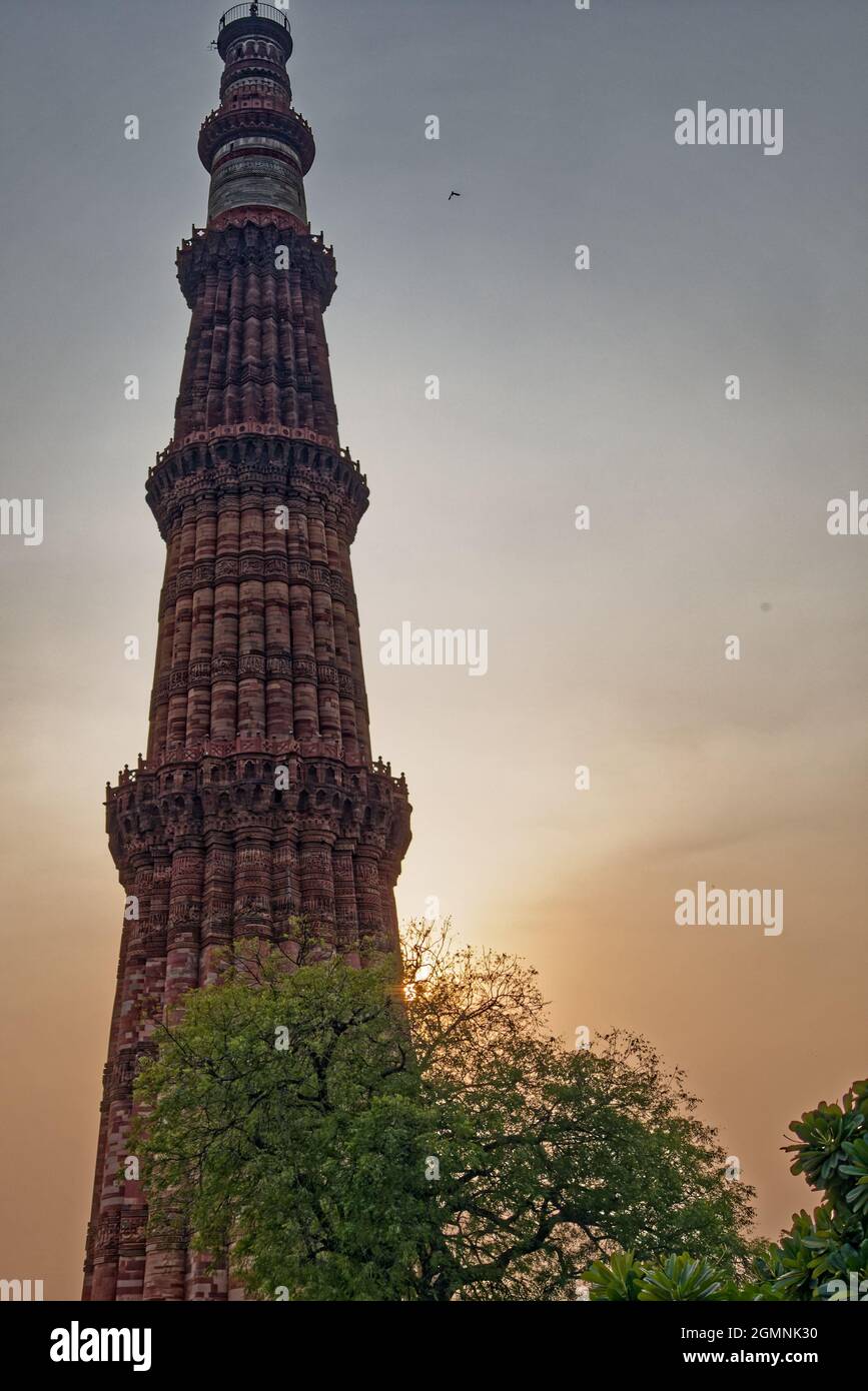 Qutub minar sunset hi-res stock photography and images - Alamy