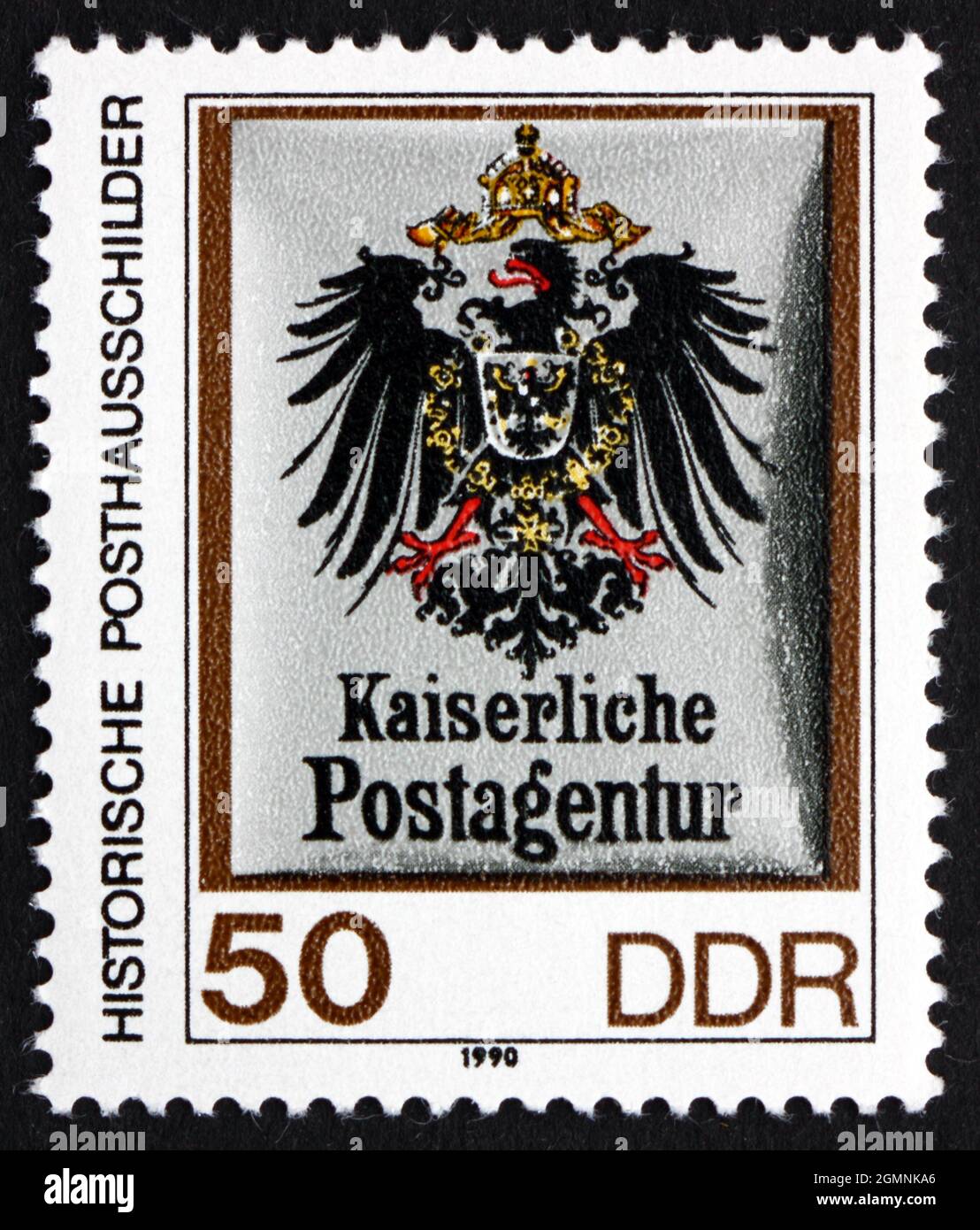 GDR - CIRCA 1990: a stamp printed in GDR shows Coat of Arms of Imperial ...