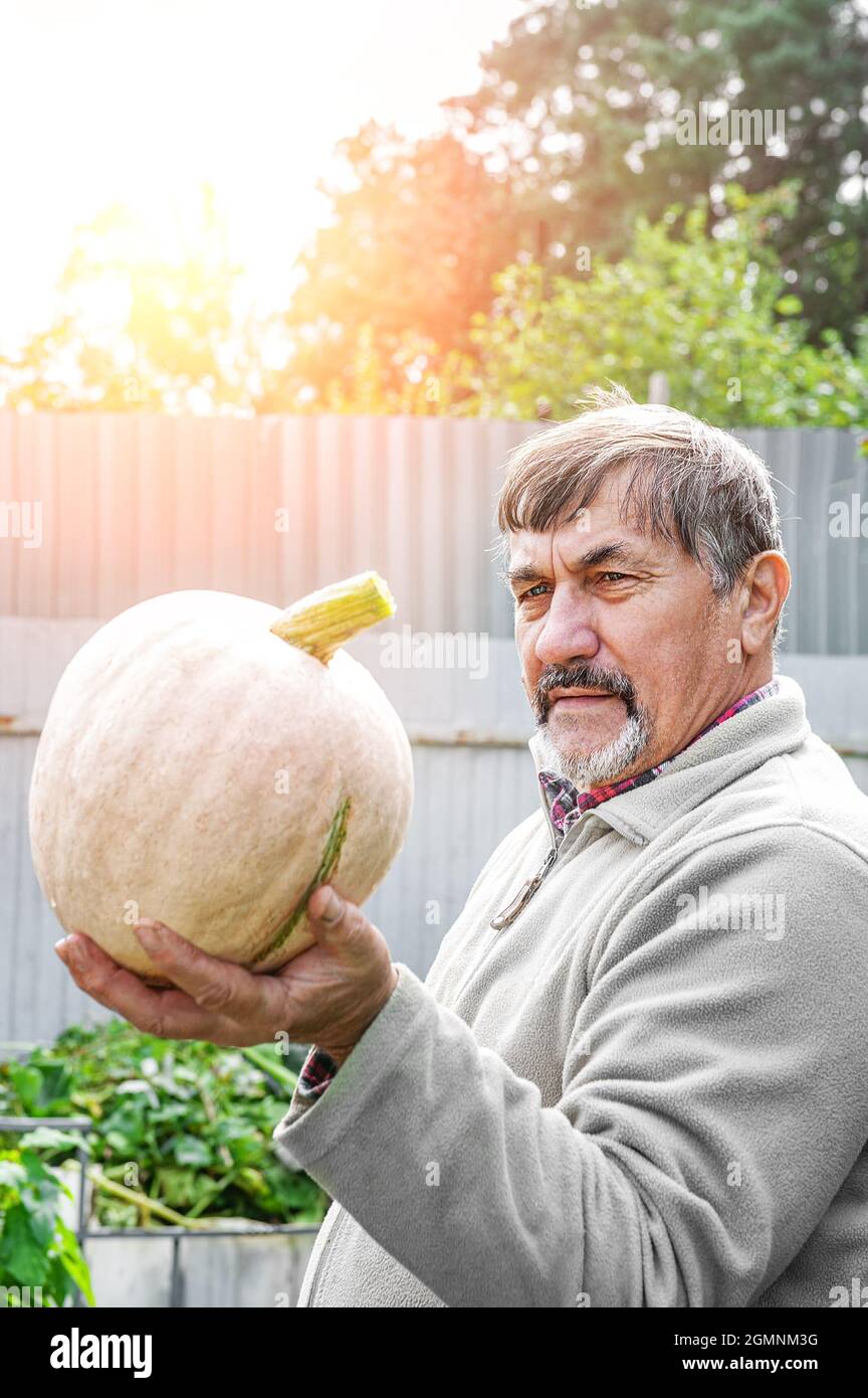 Farming lifestyle, professional occupation in agriculture. farmer holds ...