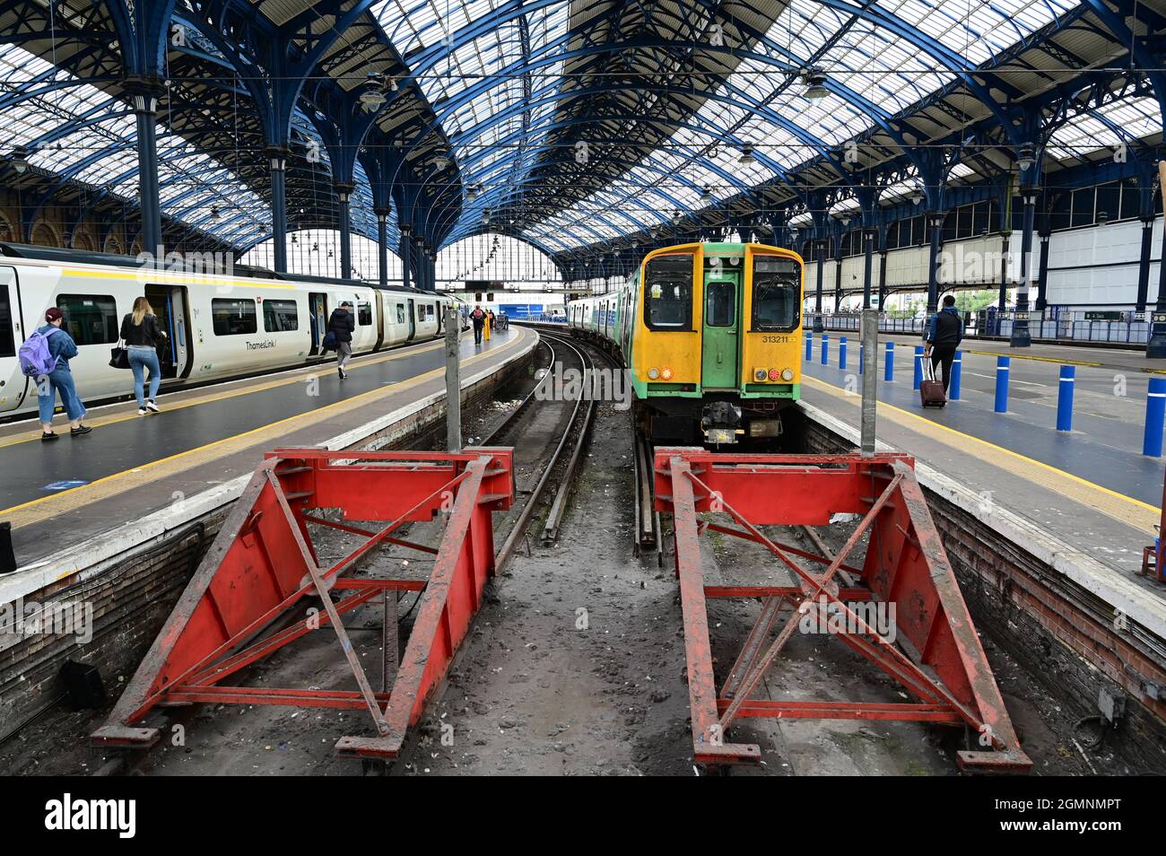 A class 313 passenger train in Brighton station inside the canopy Stock ...