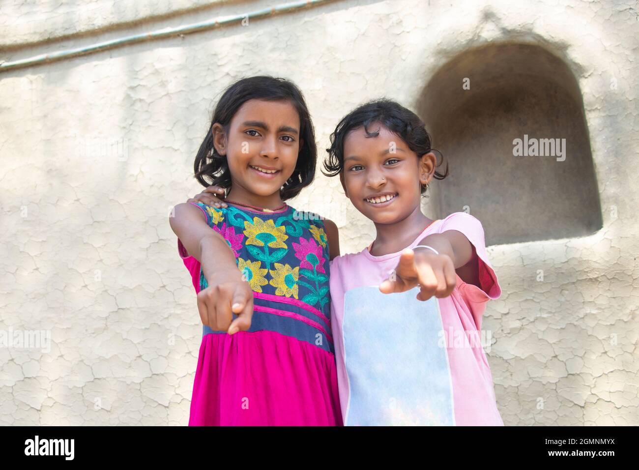 Indian girls pointing hi-res stock photography and images - Alamy