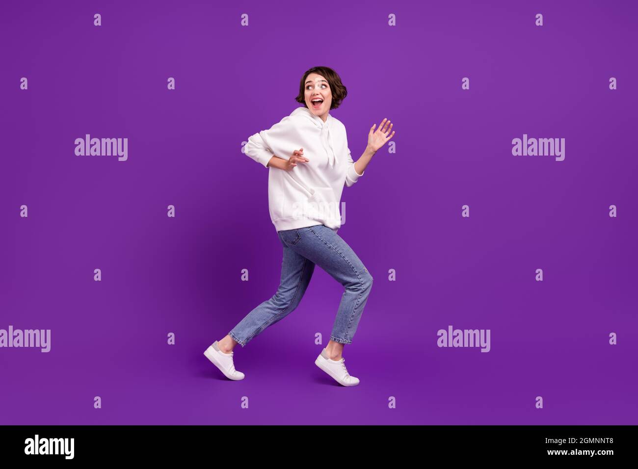 Full size photo of young happy funky girl running away playful wear ...