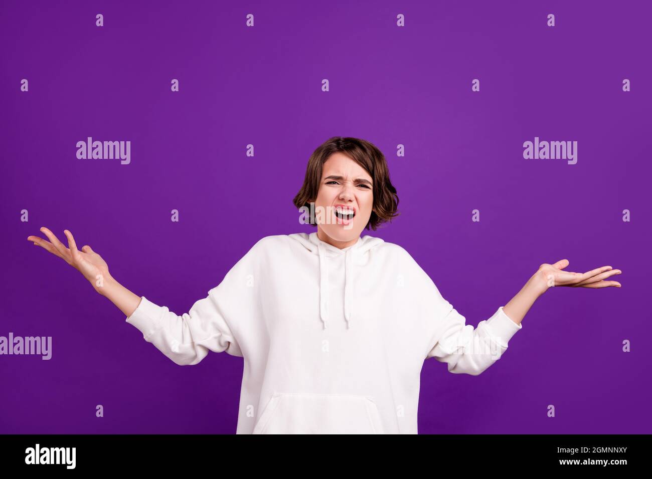 Photo portrait girl in hoody angry shrugging shoulders misunderstanding ...