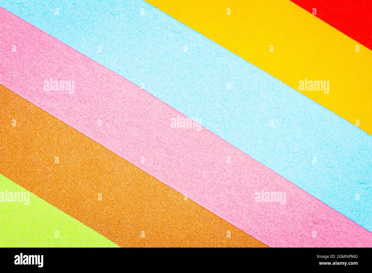 Multicolor background from a paper of different colors. Abstract ...