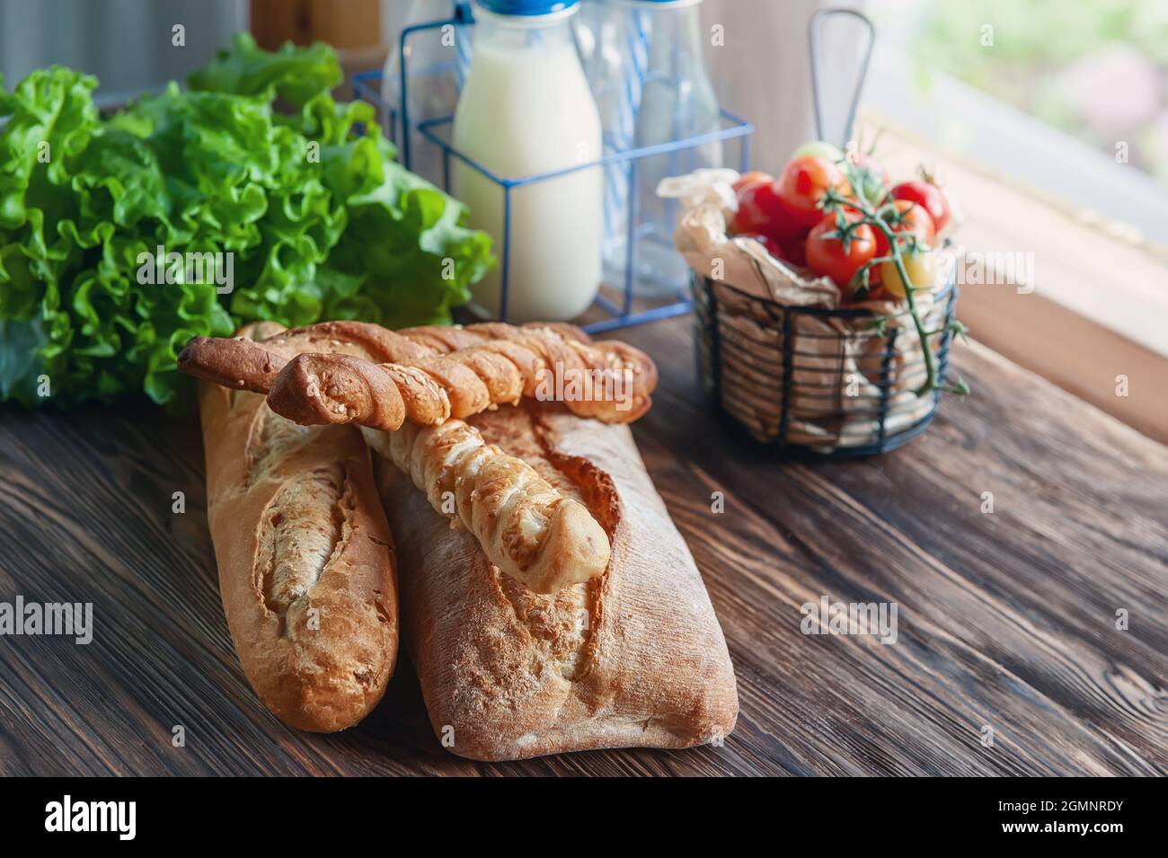 An assortment of different types of bread. Italian ciabatta bread ...