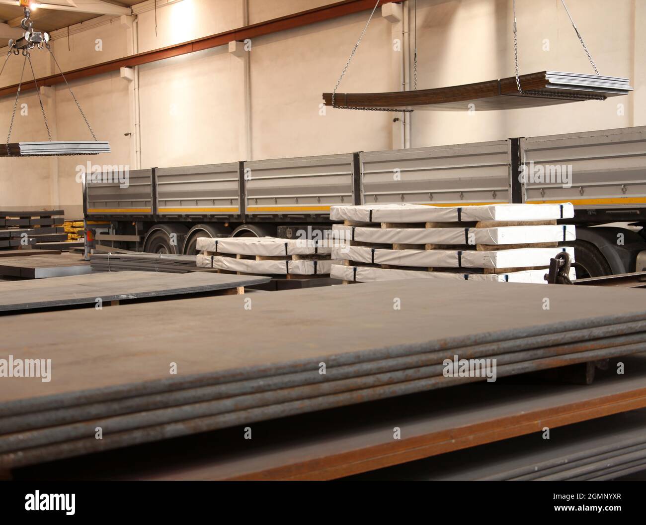 New metal sheets. Loading goods on the truck Stock Photo - Alamy