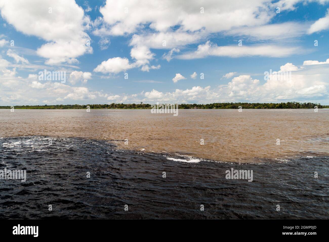 The Meeting of Waters (Encontro das Aguas) is the confluence between the Rio Negro river, with ...