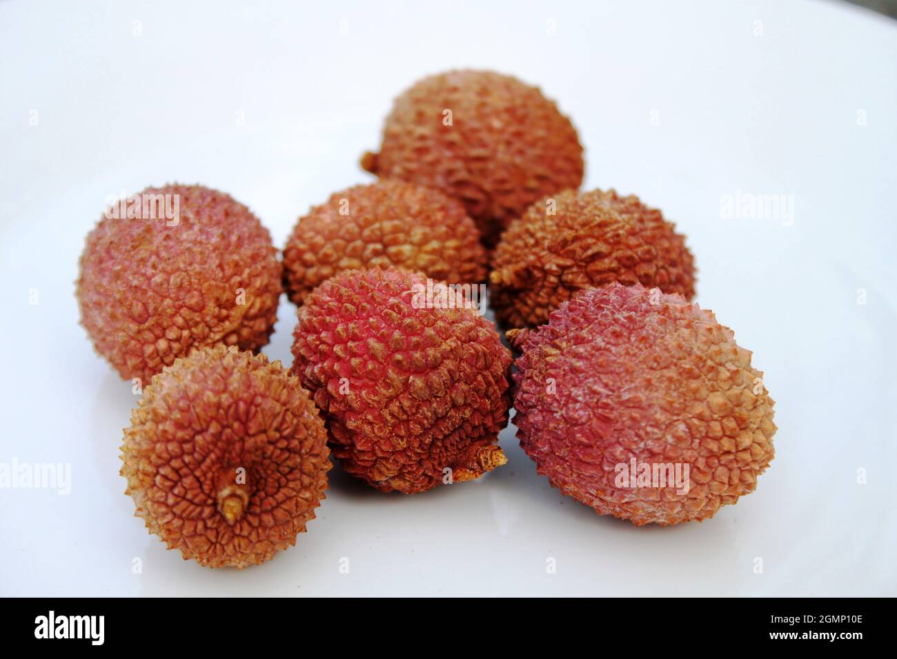 Lychee fruits isolated on white background Stock Photo - Alamy