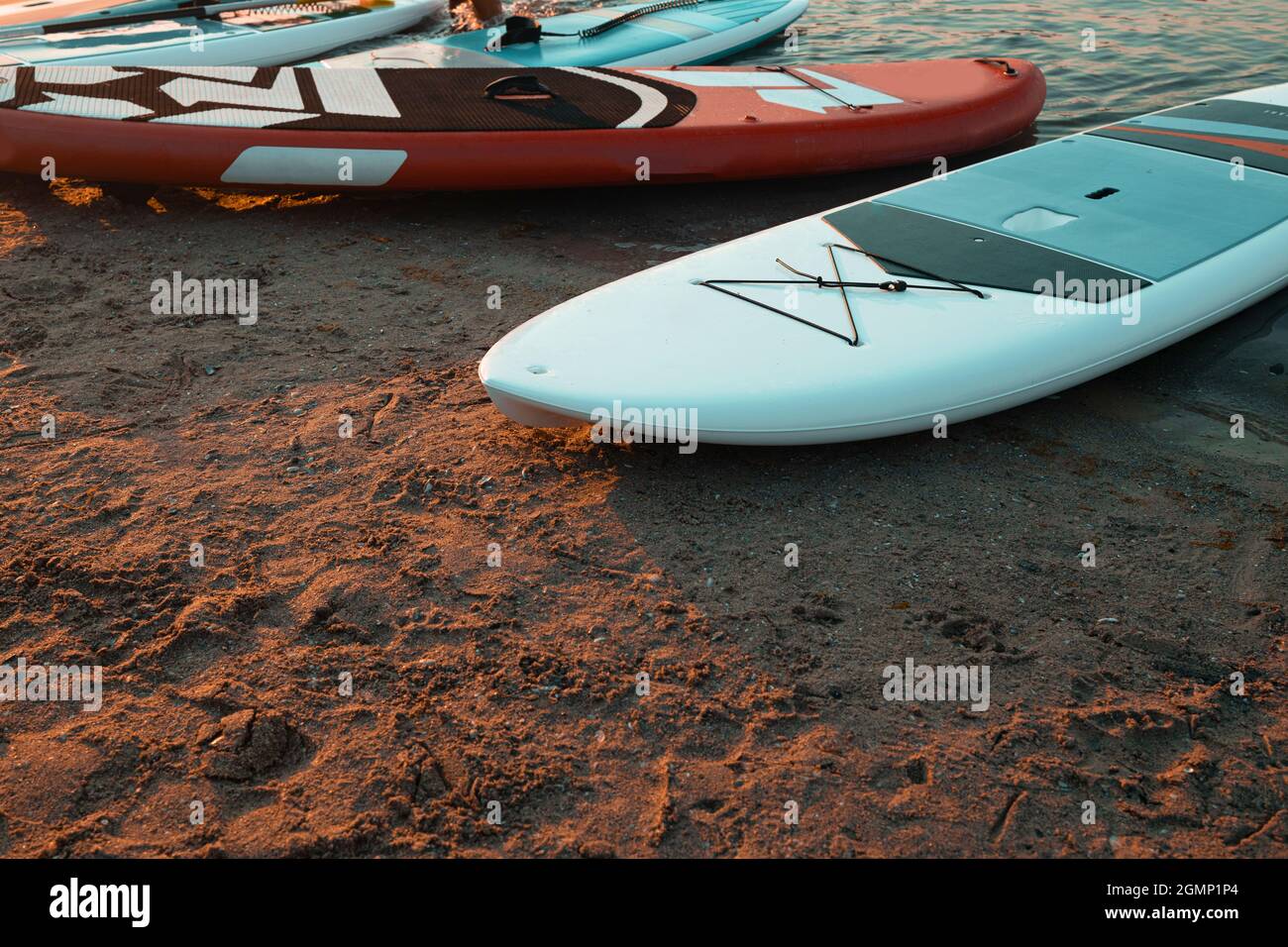 Surfer lying on surf board hi-res stock photography and images - Alamy