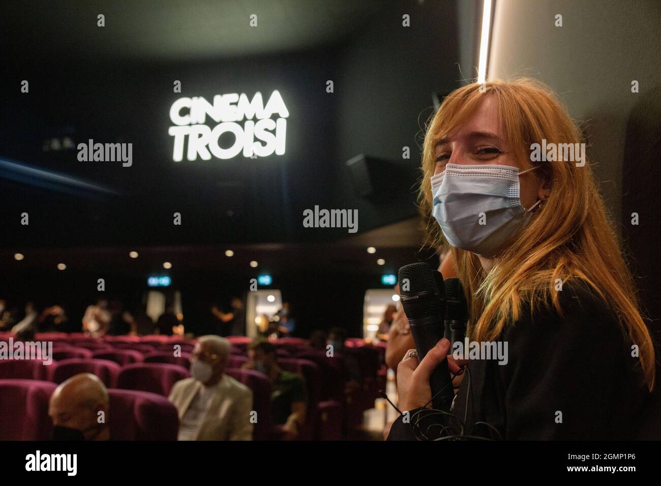 A girl volunteer of Piccolo America Association in the hall of Troisi ...