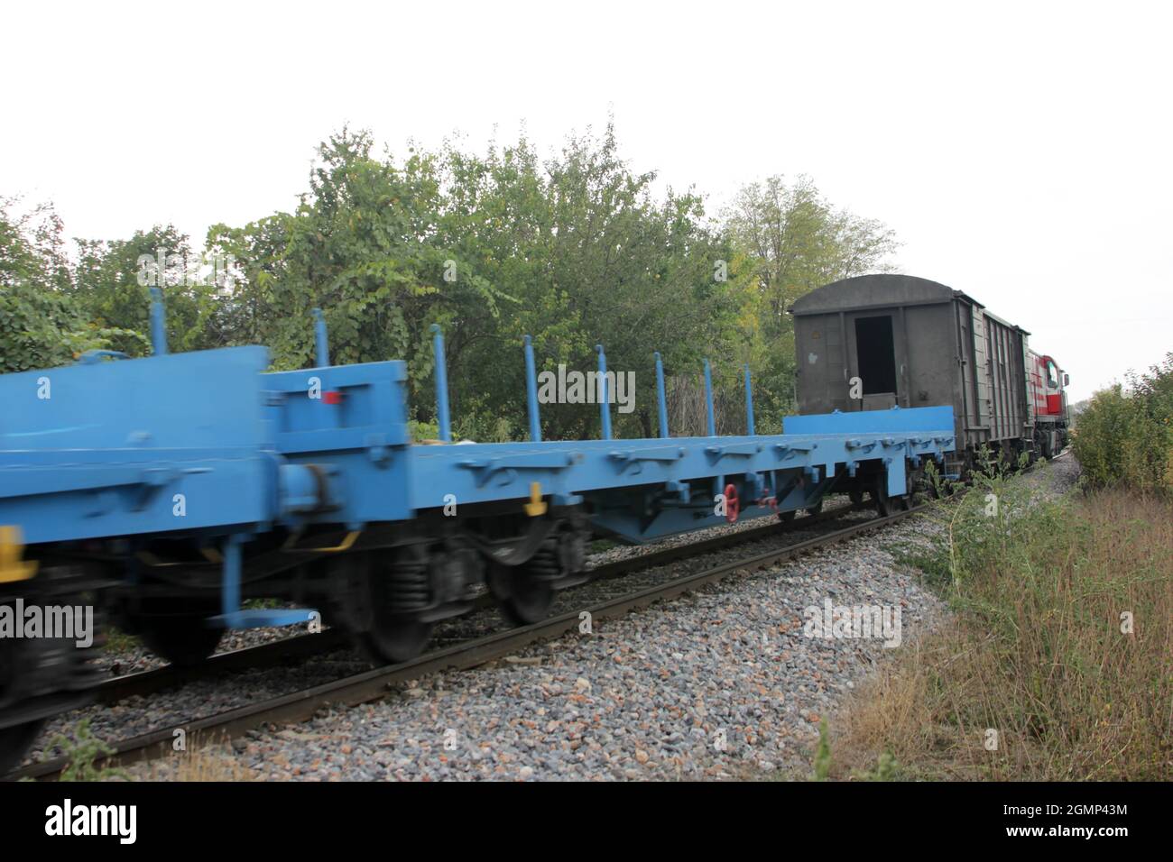 old freight train in motion Stock Photo - Alamy
