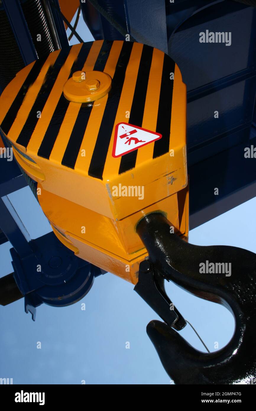 Powerful crane hook. Industrial background Stock Photo - Alamy