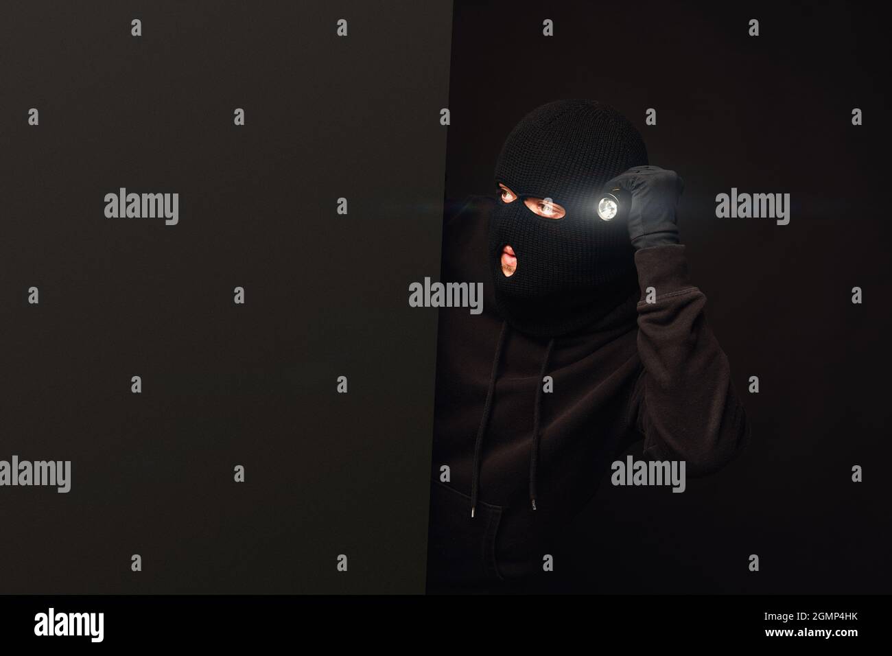 Masked man on dark hi-res stock photography and images - Alamy