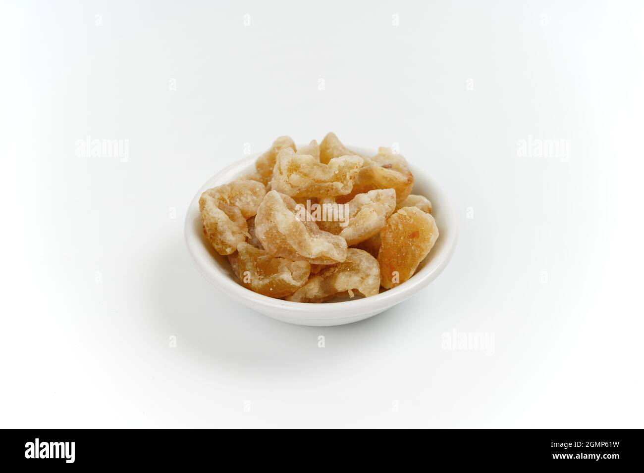 Alma Candy in Bowl Isolated on White Background Stock Photo - Alamy