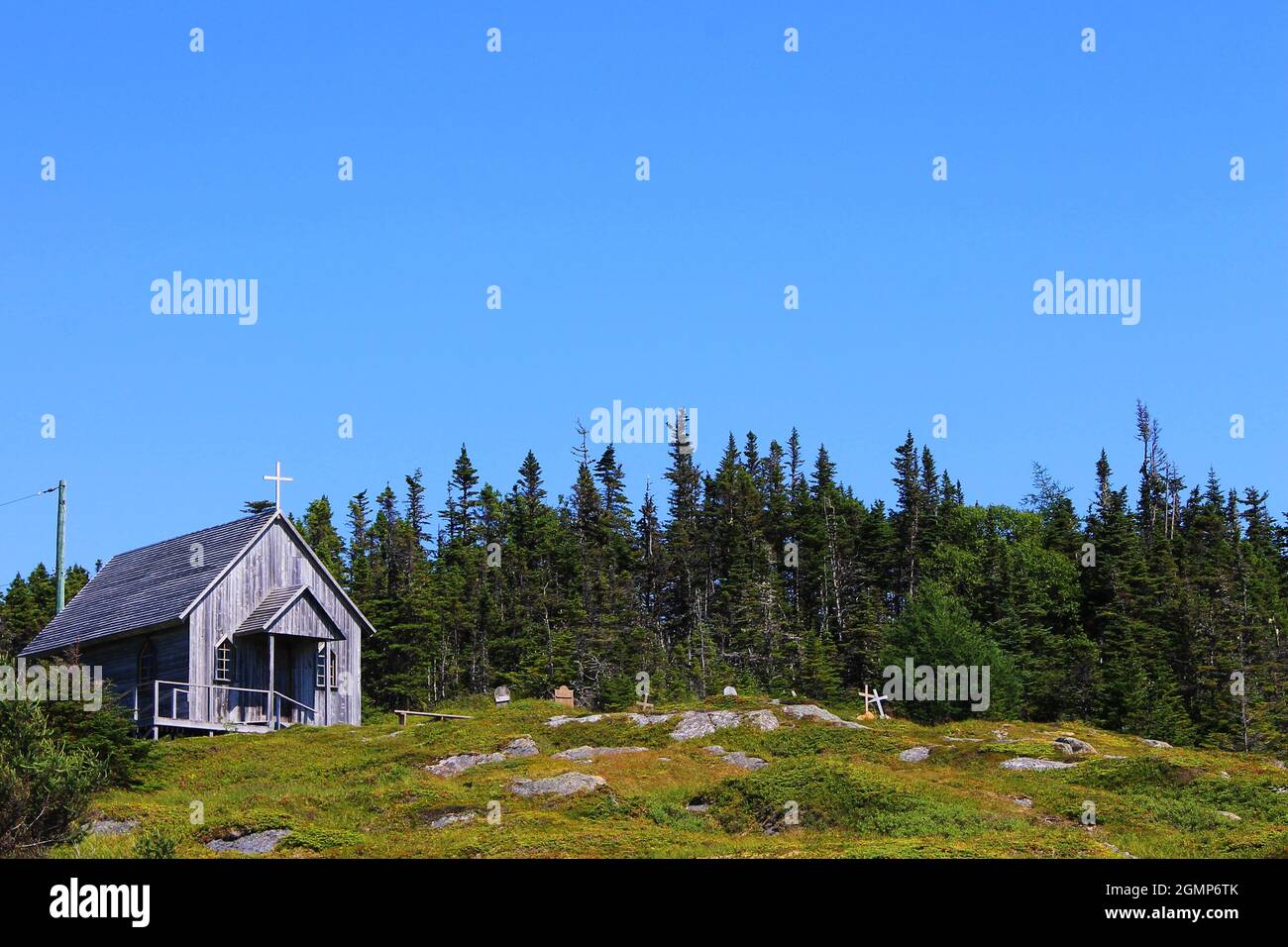 A small wooden church on a hill, Random Passage Site, New Bonaventure ...